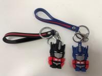 China Keychain Optimus Robot Men And Women Doll Couple Key Chain for sale