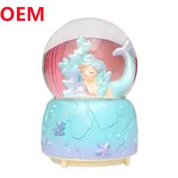 China Custom Polyresin Princess Light Up Water Globe Princess Snow Globe  With Music Box for sale