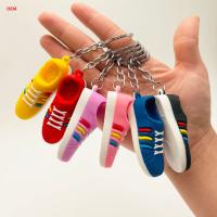 China 3D Mini Shoes Keychain Character Keychain With Metal Key Ring Custom Plasitc Figure Keychain for sale