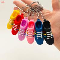 China 3D Mini Shoes Keychain Character Keychain With Metal Key Ring Custom Plasitc Figure Keychain for sale