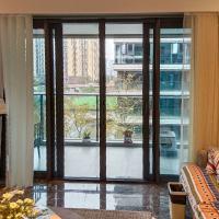 China Retractable Screen Door  Roller Screen Door Aluminum Frame Mosquito Mesh Folding Screen Door for sale