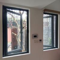 China Aluminum Sliding Retractable Screen Window Roller Retractable Fly Insect Screen Windows And Doors for sale