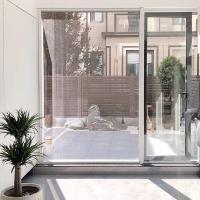 China 1.4mm Aluminum Alloy Frame Retractable Bi Fold Door Retractable Fly Screen Door for sale