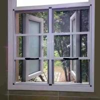 China Mosquito Retractable Sliding Roller Retractable Screen Window for sale