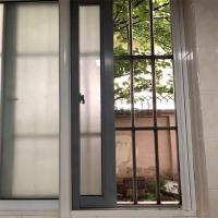China Aluminum Alloy Fiberglass Retractable Screen Door Roller Screen Door Customized for sale