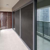 China Modern Single / Double Glazing Mesh Sliding Retractable Door for sale