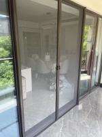 China Retractable Roller Shutter Door with Contemporary Style and Black Mesh Color for sale