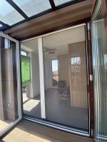 China Invisible Screen Door Trackless Screen Door Easy Installation Aluminium Alloy Mosquito Net Door for sale