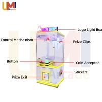China Custom Coin-Operated Arcade Vending Games 40 Clips Prize Gift Claw Machine Game for sale