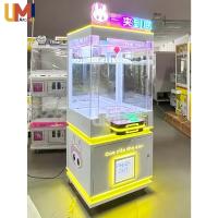 China Custom Coin-Operated Arcade Vending Games 40 Clips Prize Gift Claw Machine Game for sale