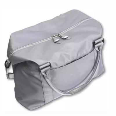 China Custom Large Capacity Waterproof Duffel Bag Overnight Weekend Duffle Bag Womens for sale