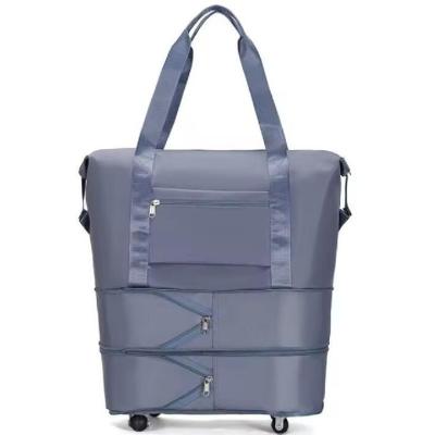 China Large Capacity Expandable Hand Luggage Bag With Wheels for sale