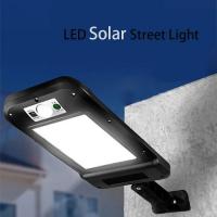 China ABS Solar Powered LED Street Lights 4 COB Solar Sensor Flood Light PS 2pcs Lithium 18650 1200mAh for sale