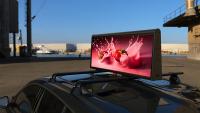 China High Refresh RGB P2.96mm Taxi Roof LED Display SMD Advertising Signs for sale