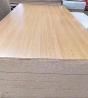 China 18mm Melamine Faced OSB Chipboard Panel - Moisture Resistant Wood Door Sheet for Kitchen Cabinets and Furniture for sale