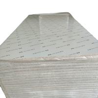China 18mm PET OSB Laminated Flake Board 1220x2440mm Moisture Resistant Panel for Furniture and Cabinets for sale
