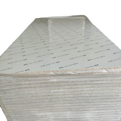 China 18mm PET OSB Laminated Flake Board 1220x2440mm Moisture Resistant Panel for Furniture and Cabinets for sale
