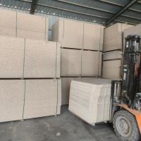 China 18mm PET OSB Laminated Flake Board 1220x2440mm Moisture Resistant Panel for Furniture and Cabinets for sale
