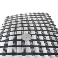 China Cement Pavement Reconstruction High Temperature Rutting Resistance Fiberglass Geogrid for sale