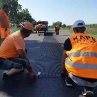 China 30KN-200KN Fiberglass Grid Geogrid Made in Affordable for Railway Ground Reinforcement for sale
