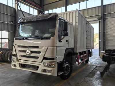 China Used Howo Cargo Truck Left Hand Driving With 9500*2400mm Cargo Body for sale