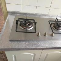 China Oil Proof Kitchen Backsplash Wallpaper Self Adhesive Waterproof Foil Stickers for Kitchen for sale
