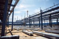 China Large Sized Modular Steel Structures Q355B Q460 Steel Warehouse Building Hurricane Proof for sale