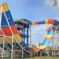 China 304 Stainless Steel Fiberglass Water Park Spiral Slide 18m Height 100m Length Custom Thrill Ride for sale