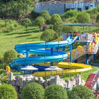 China Fiberglass 304 Steel Looping Water Slides Thrill Slide Water Park Equipment Spiral Water Slide Body Raft for sale