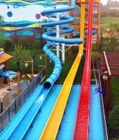 China Rainbow Water Slide Double Spiral Water Slide One Combo Multi-Lane Racing Thrills FRP 304 Stainless Steel for sale