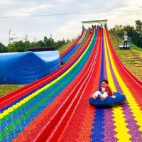China Commercial Large Rainbow Dry Slide Land Slide Wheeled Slider Block  Expansion Ride Campsites rainbow slide on the hill for sale