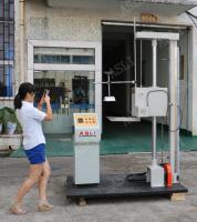 China Customized Carton Drop Test Machine 300-1500mm Drop Height 100kg Capacity for sale