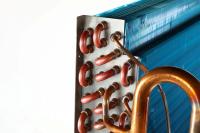 China Customized Copper Evaporator Coil Heat Exchanger with 1.4~2.0mm Fin Space and 21*12.7mm Hole Pitch for sale