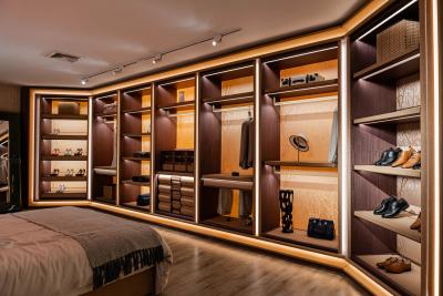 China Custom Luxury Walk-In Closet System, Dark Wood Built-In Wardrobe with LED Lighting, Full Storage Layout for Bedroom Interiors for sale