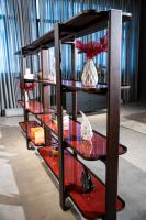 China Modern Dark Wood Open Display Shelf with Red Glossy Shelves, Multi‑Tier Freestanding Storage Rack for Living Room & Hotel Lobby for sale