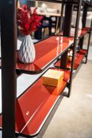 China Modern Dark Wood Open Display Shelf with Red Glossy Shelves, Multi‑Tier Freestanding Storage Rack for Living Room & Hotel Lobby for sale