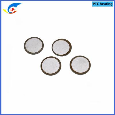 China Round 14mm Diameter PTC Thermistor Heating Element Chip 2.2 Ohm 12V 80 Degrees for sale