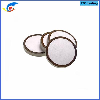 China Circular PTC Chip Resistor Thermistor 14mm Dia 2.2 Ohm 12V 100 Degrees Heating Element for sale