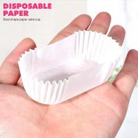 China Rk Bakeware Oval Paper Baking Mold Boat Shaped Cake Cup For Industrial Automatic Lines for sale