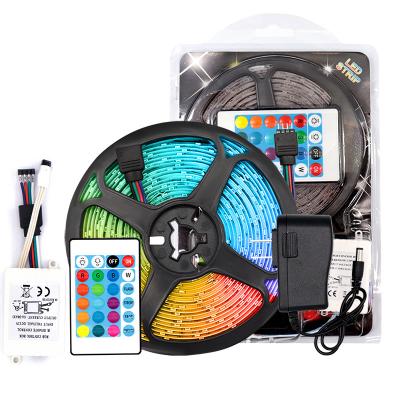 China Hot Sell Smd3528 2835 300leds Rgb 5m Set Ip65 Color Remote Controller Led Strip Light Set For Party for sale