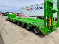 China 120T Max Payload Steel Flatbed Semi Trailer for Heavy Duty Transportation Solution for sale