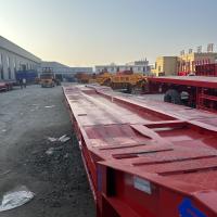 China 789-Axis Multi-Axis Flatbed Low-Bed Trailer for Large Trucks Huaxiang 's Best Choice for sale