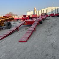 China 789-Axis Multi-Axis Flatbed Low-Bed Trailer for Large Trucks Huaxiang 's Best Choice for sale