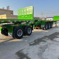 China 28 Ton Steel Platform Landing Gear Container Flatbed Semi-Trailer for Steel Transport for sale