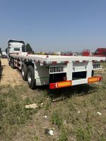 China Zambia Tri Axles 60 Tons Flatbed Semi-Trailer for 20/40 Foot FT Container Shipping for sale