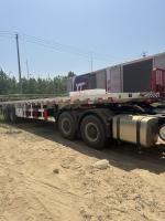 China Zambia Tri Axles 60 Tons Flatbed Semi-Trailer for 20/40 Foot FT Container Shipping for sale