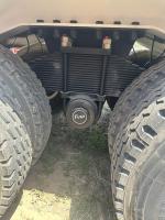 China Zambia Tri Axles 60 Tons Flatbed Semi-Trailer for 20/40 Foot FT Container Shipping for sale