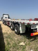 China Zambia Tri Axles 60 Tons Flatbed Semi-Trailer for 20/40 Foot FT Container Shipping for sale