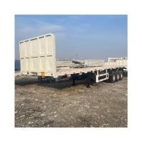 China Semi-Trailer 4 Axle 40Ft Flat Bed Flatbed Trailer with 3mm Thick Pattern Steel Plate for sale