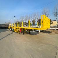 China 13750*2550*3850mm Steel 3 Axle 40Ton 60T 28Ton Land Gear Container Flatbed Semi Trailer for sale